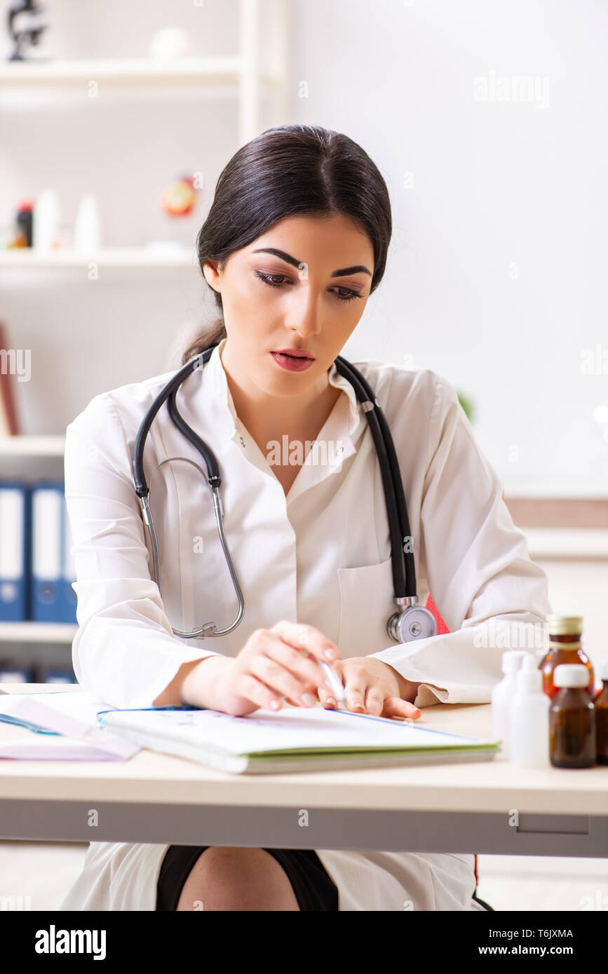 The woman doctor working in the hospital Stock Photo - Alamy