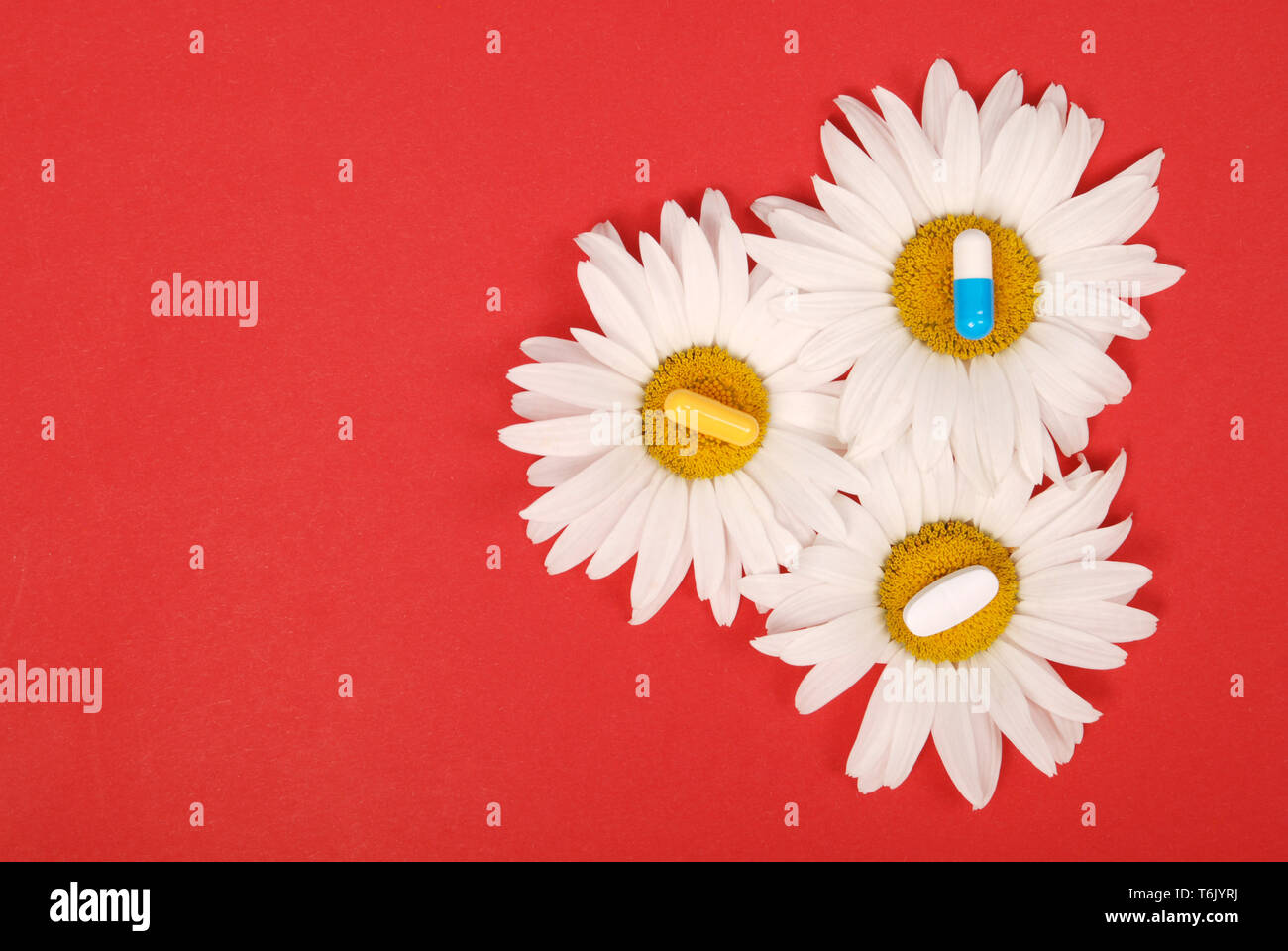 Vitamin capsule flower yellow hi-res stock photography and images - Alamy