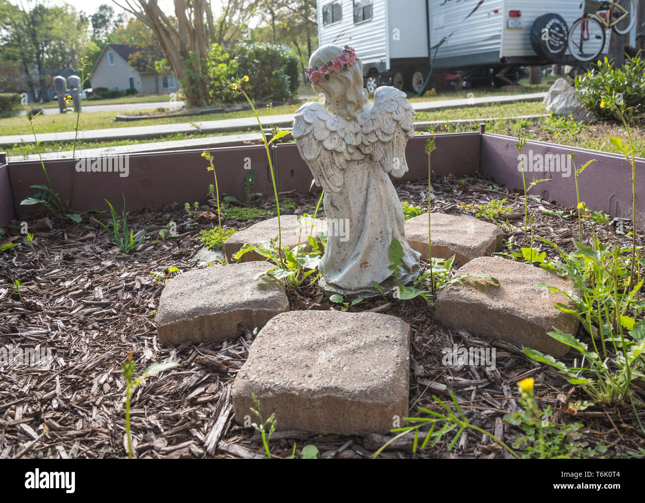 Honoring beloved family members in a memorial Garden set up in a yard ...