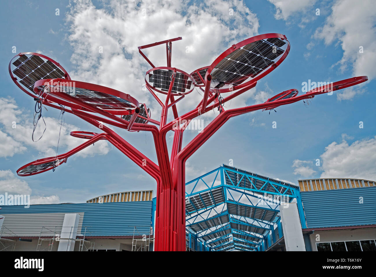 One of seven solar trees that will stand about two stories tall in the ...