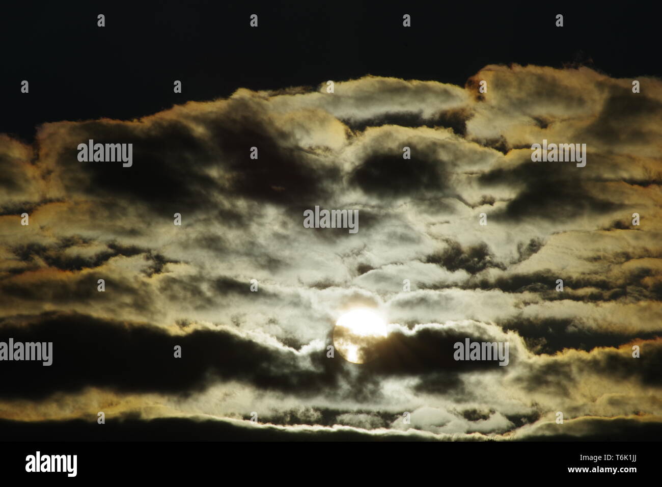 Golden Backlit Altocumulus Clouds at Sunset. Natural Background. Crail ...