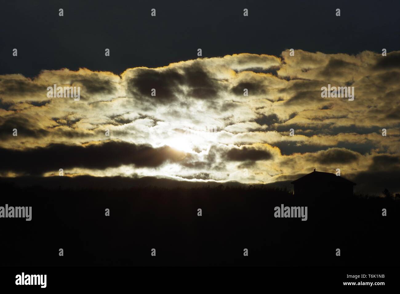 Golden Backlit Altocumulus Clouds at Sunset. Natural Background. Crail ...