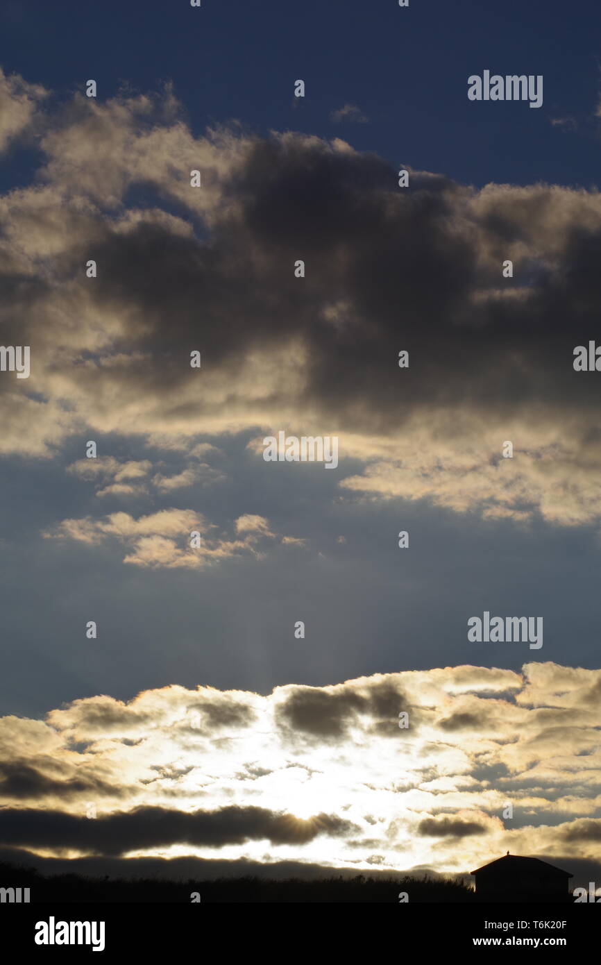 Golden Backlit Altocumulus Clouds at Sunset. Natural Background. Crail ...