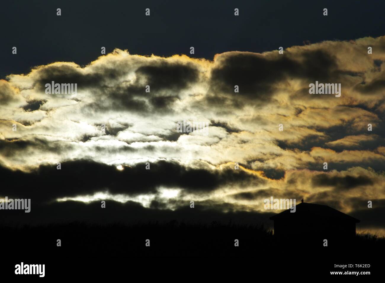 Golden Backlit Altocumulus Clouds at Sunset. Natural Background. Crail ...