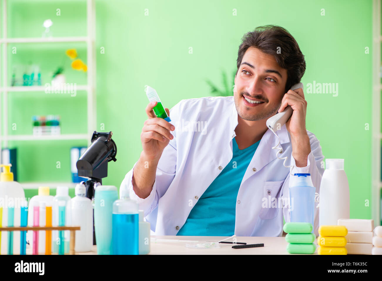Chemist testing soap in the lab Stock Photo - Alamy