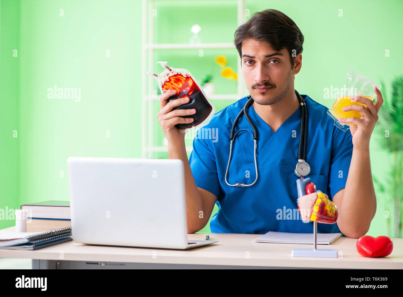 Doctor doing blood analysis in the lab Stock Photo - Alamy