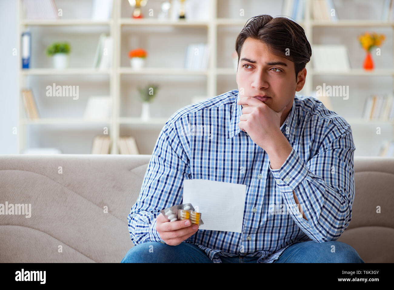 Drugs at home on sofa hi-res stock photography and images - Alamy