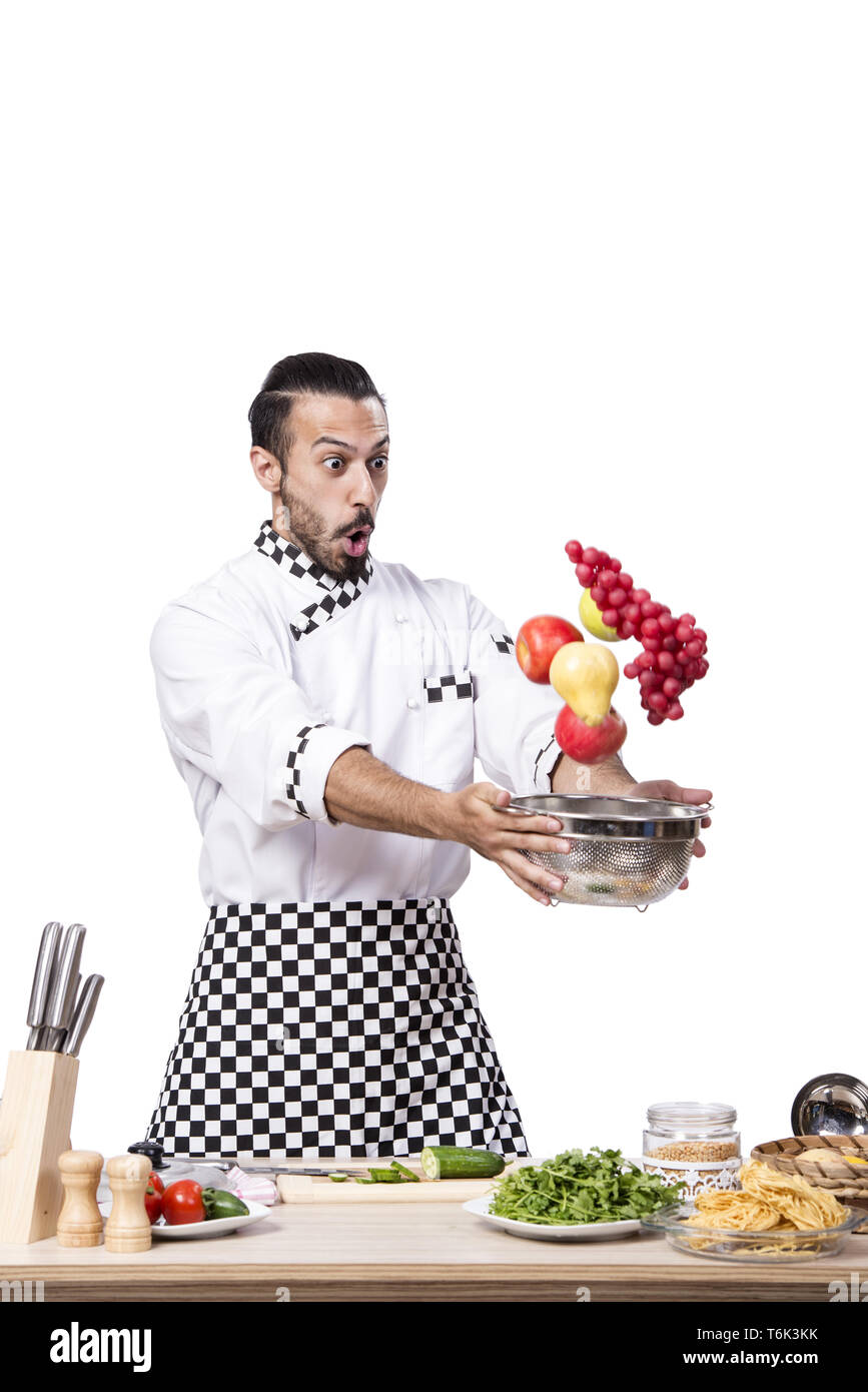 Funny male cook isolated on the white background Stock Photo - Alamy