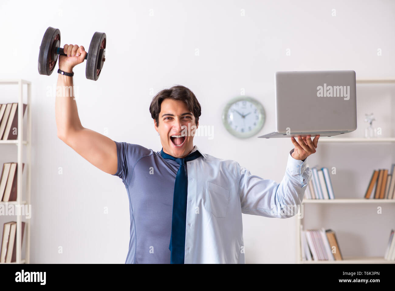 Employee combining work and healthy lifestyle Stock Photo - Alamy