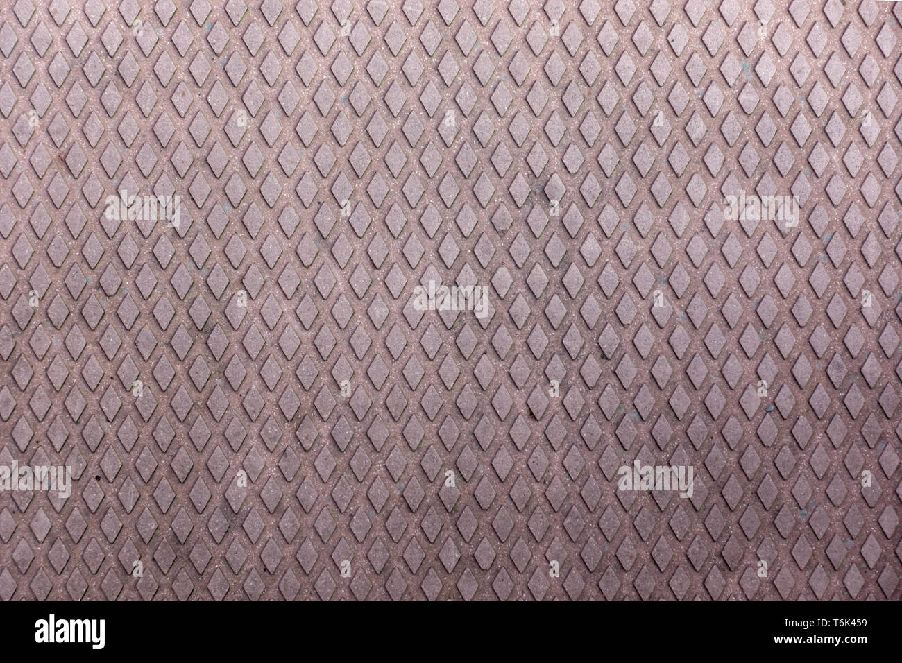 Rusty metal plate with diamond shapes protruding Stock Photo - Alamy