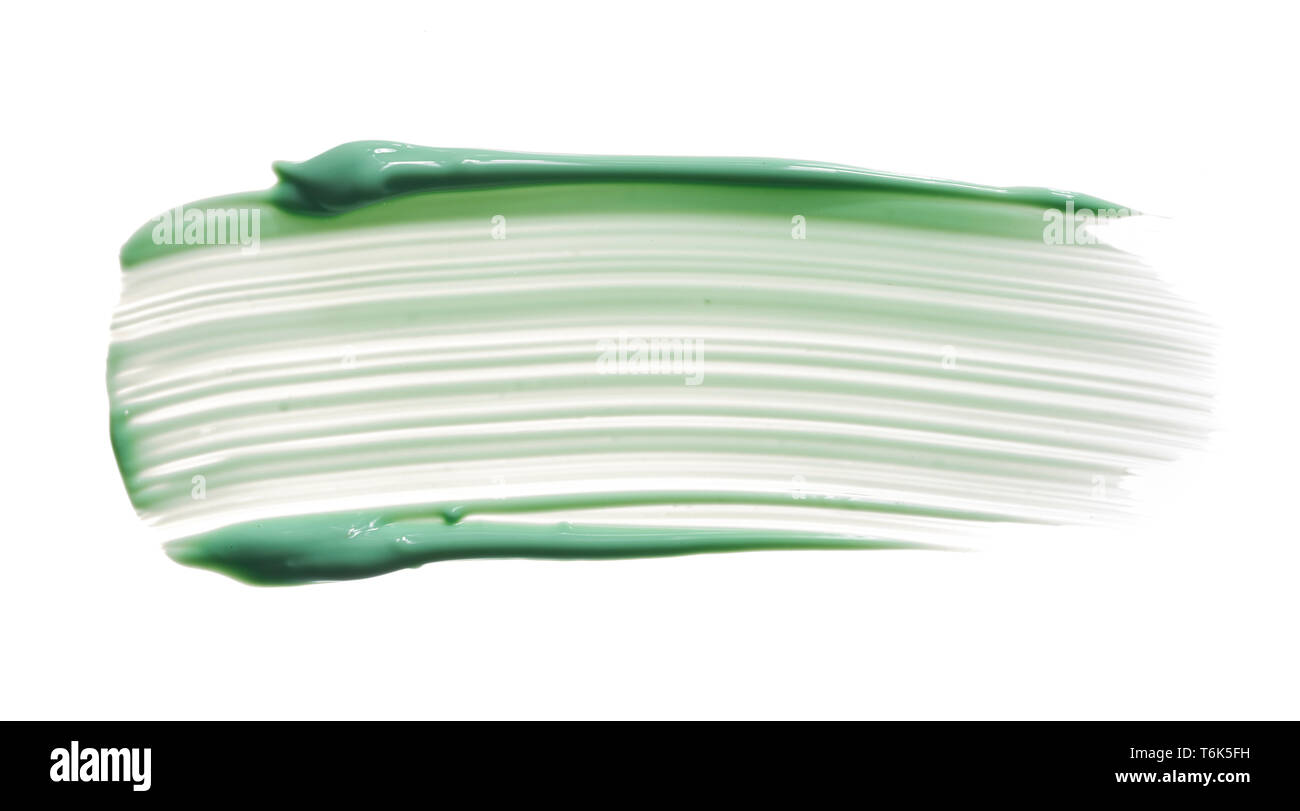 Smears and texture of cosmetic green cream isolated on white background ...