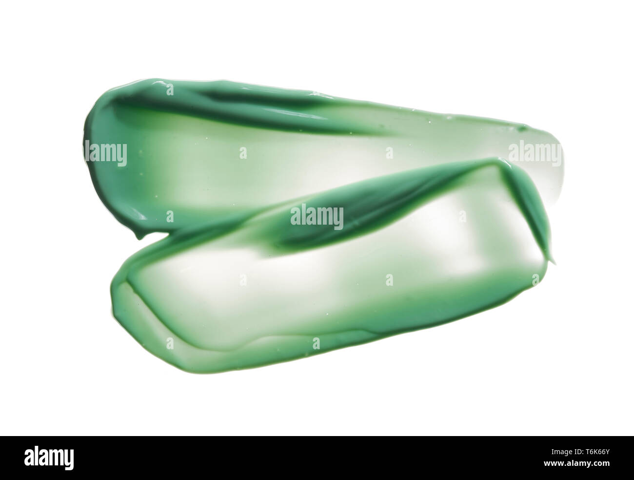 Smears and texture of cosmetic green cream isolated on white background ...
