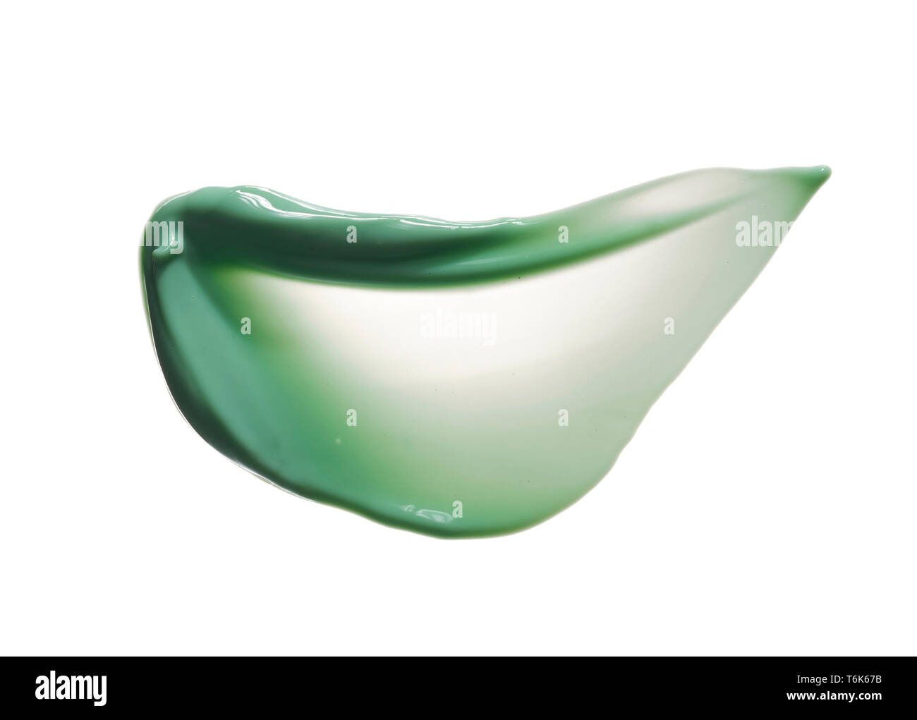 Smears and texture of cosmetic green cream isolated on white background ...