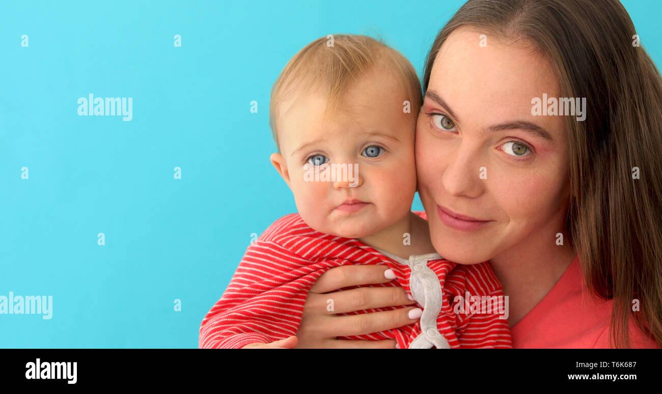 Caring mother playing with happy little baby Stock Photo - Alamy