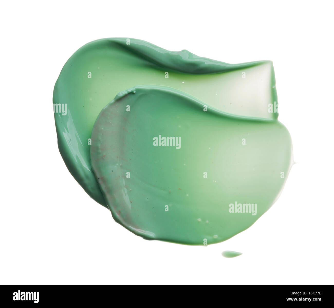 Smears and texture of cosmetic green cream isolated on white background ...