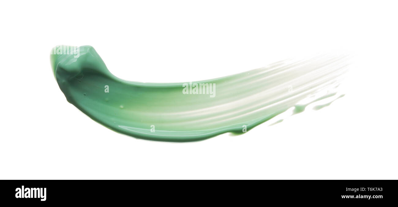 Smears and texture of cosmetic green cream isolated on white background ...