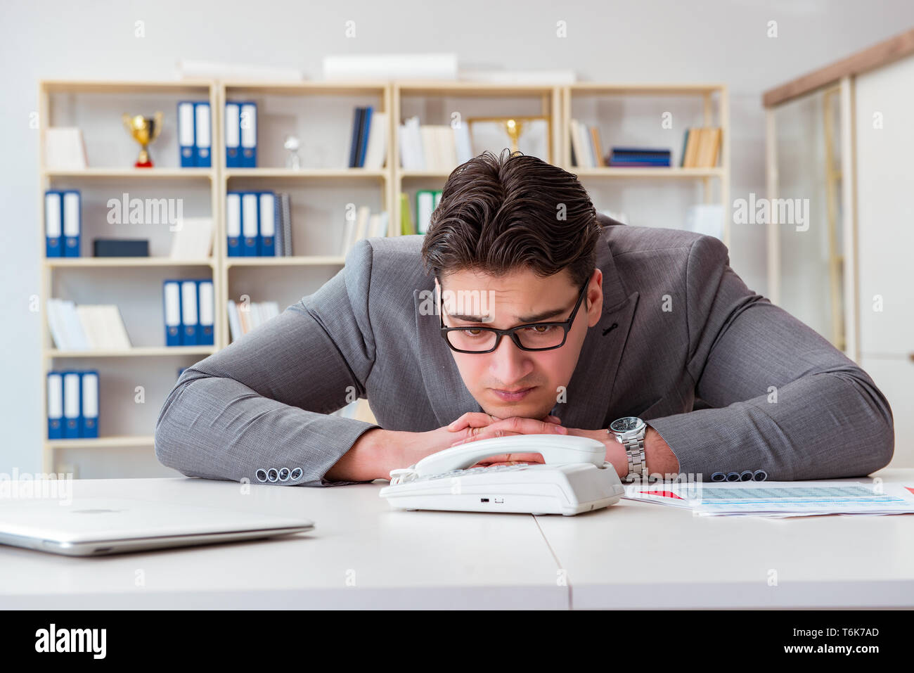 The businessman expecting important call on phone Stock Photo - Alamy