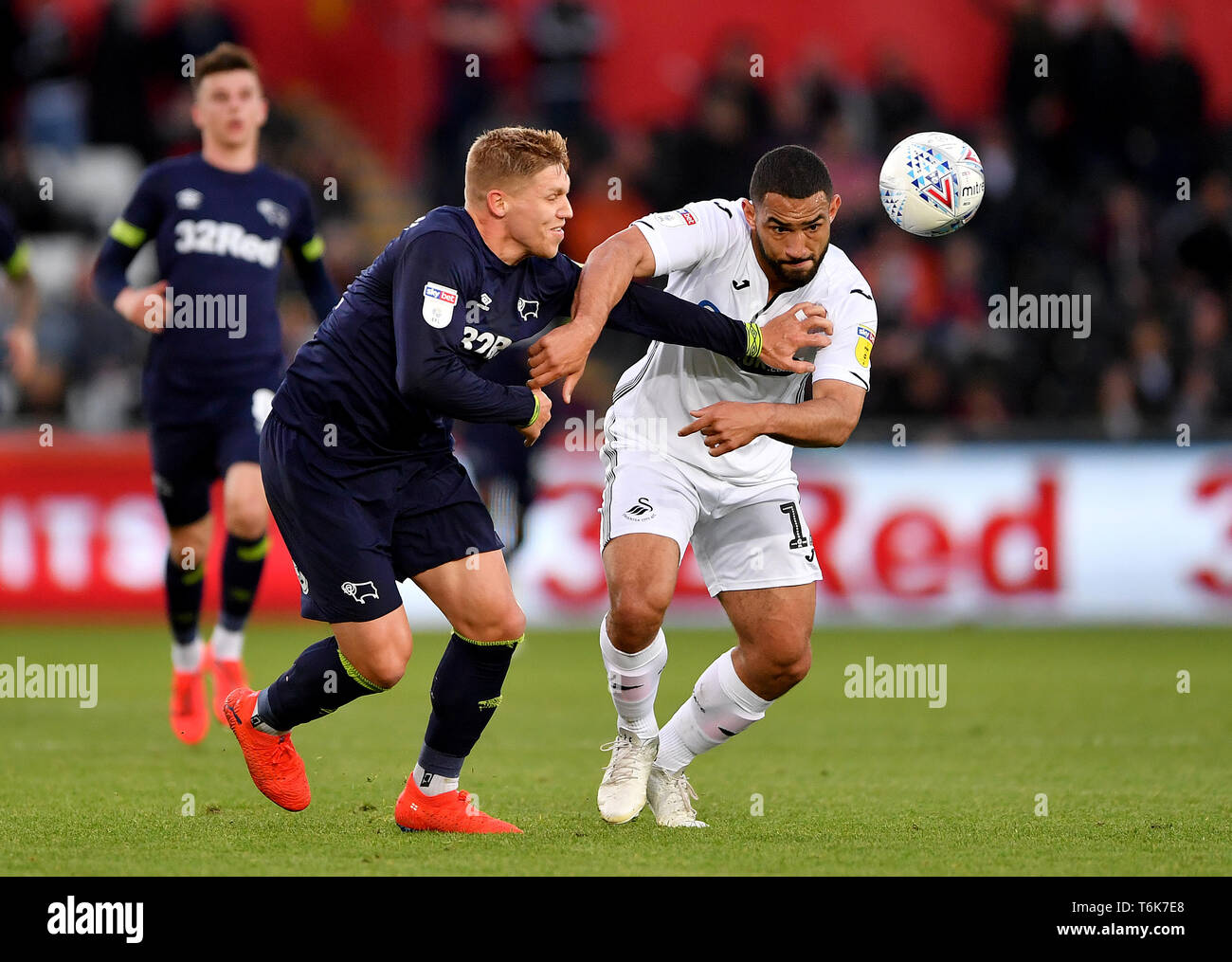 Derby County's Martyn Waghorn (left) and Swansea City's Cameron Carter ...