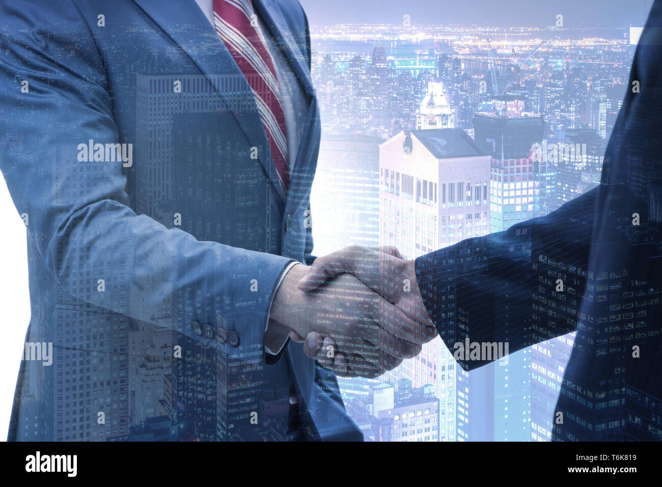 The business concept of cooperation with handshake Stock Photo - Alamy
