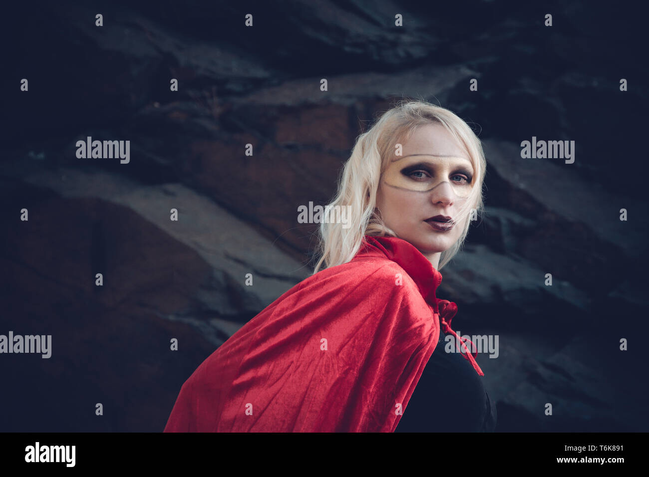 Woman wearing superhero cape hi-res stock photography and images - Alamy