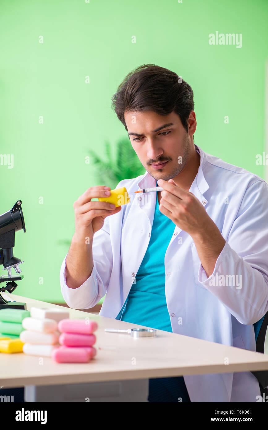 The chemist testing soap in the lab Stock Photo - Alamy