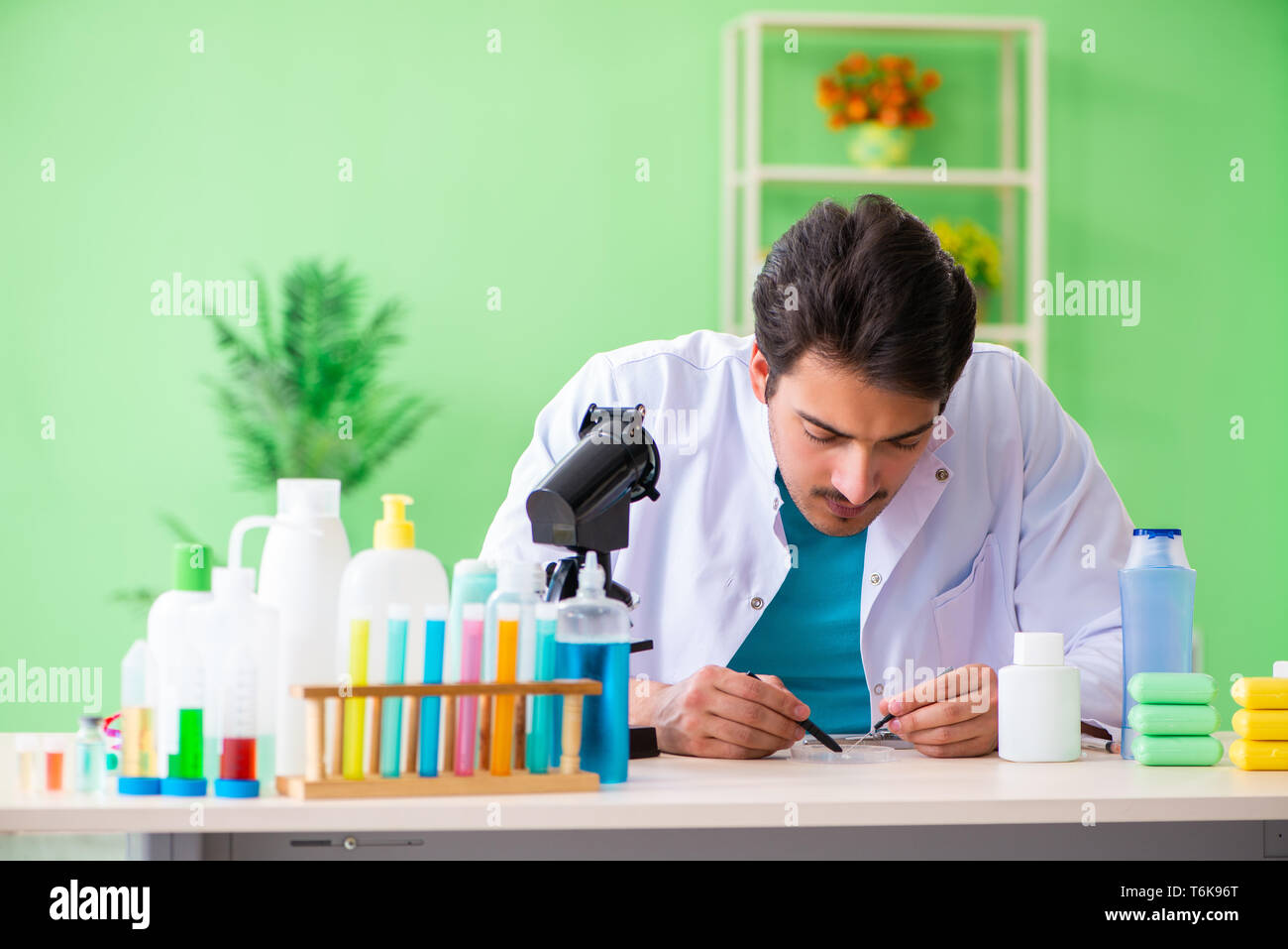 The chemist testing soap in the lab Stock Photo - Alamy