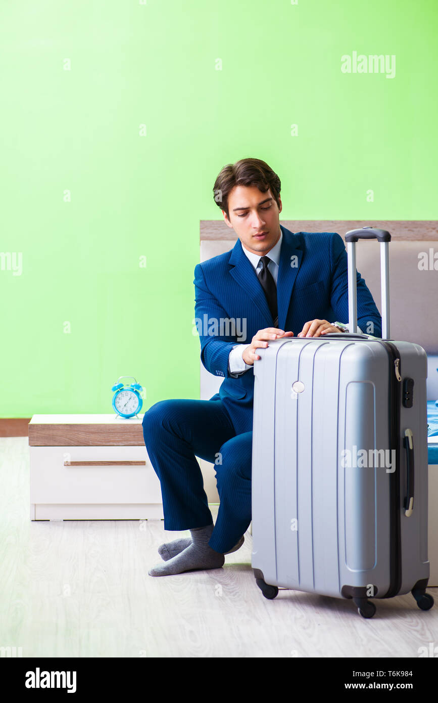 The businessman working in the hotel room Stock Photo - Alamy