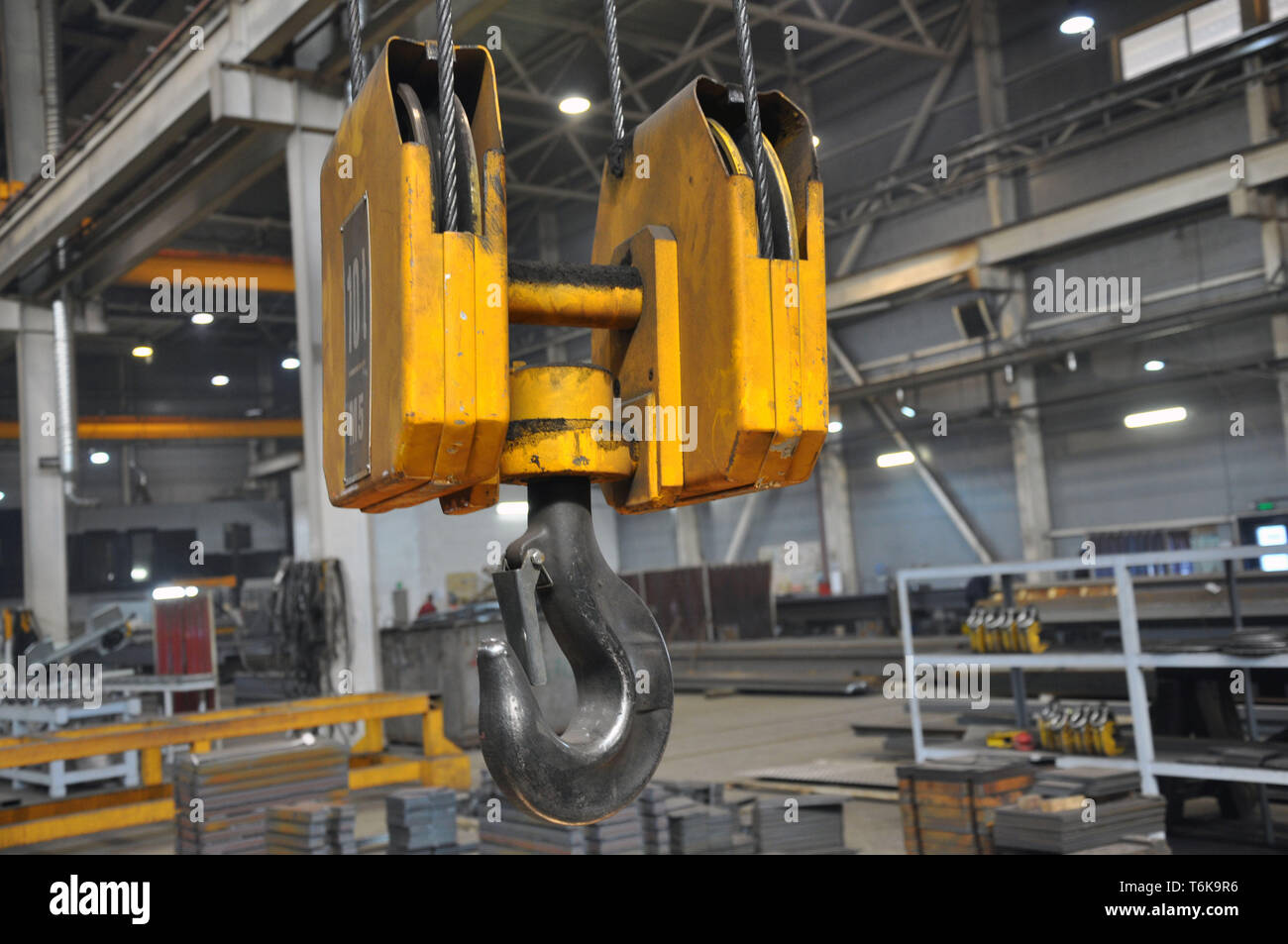 Metallic industrial hook for lifting heavy thing in the factory ...