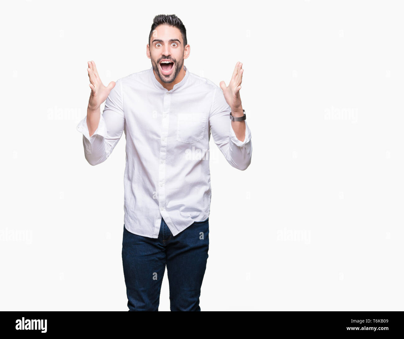 Young business man over isolated background celebrating crazy and ...