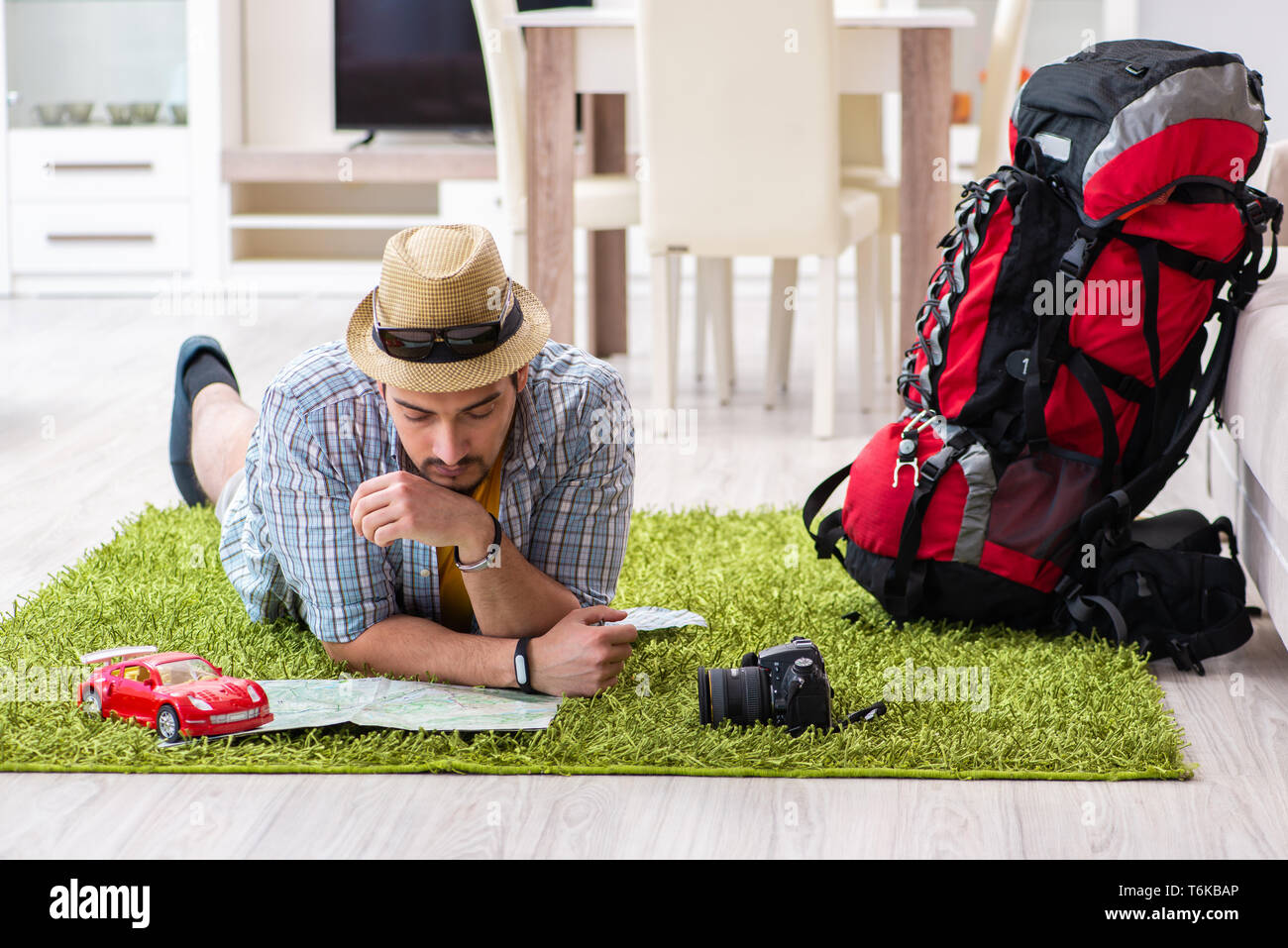 The man planning his travel with map Stock Photo - Alamy
