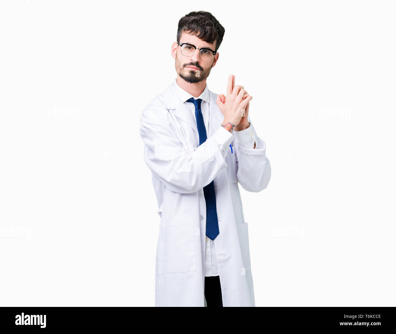 Young professional scientist man wearing white coat over isolated ...