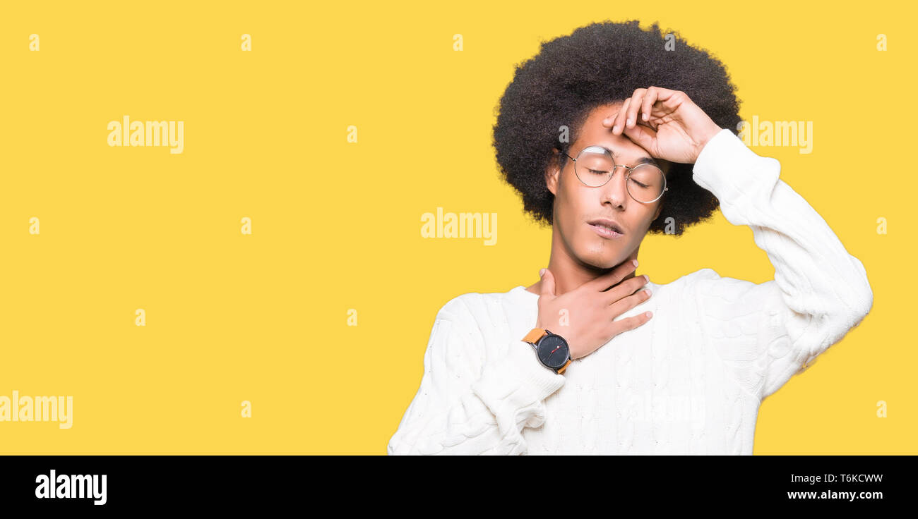 Young african american man with afro hair wearing glasses Touching ...
