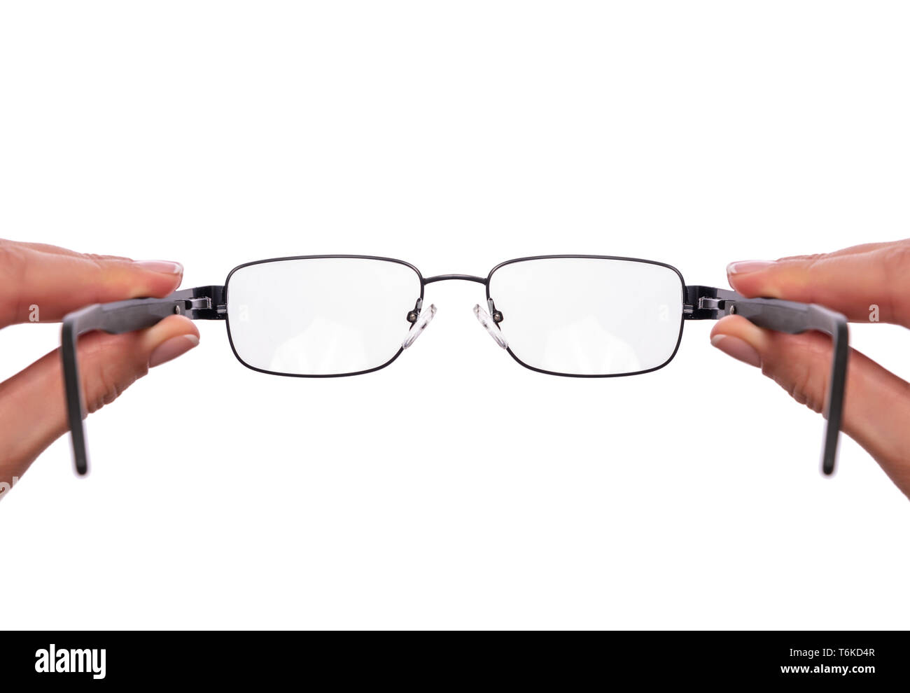 Glasses in a female hand on white background Stock Photo - Alamy