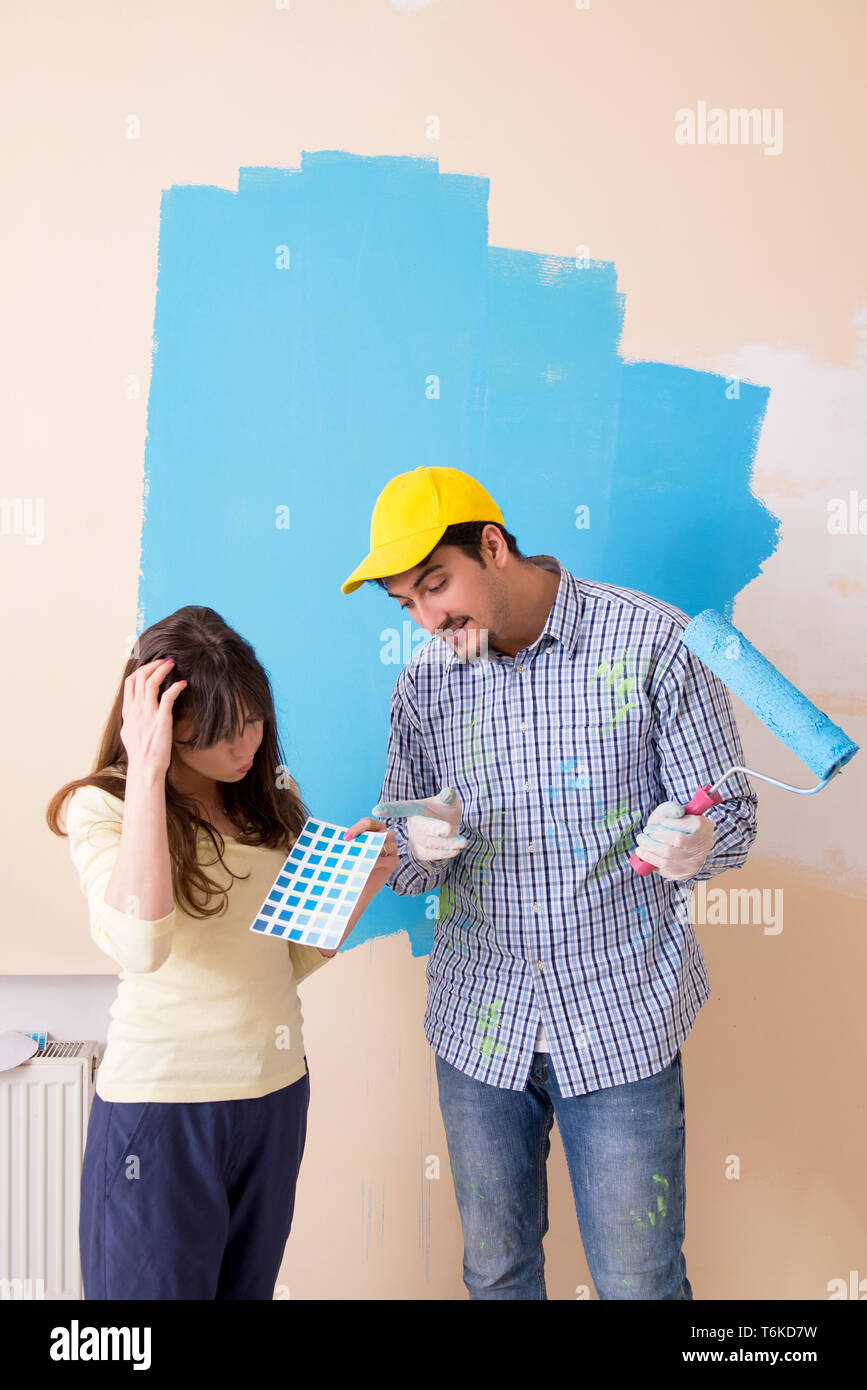 Husband and wife doing renovation at home Stock Photo - Alamy