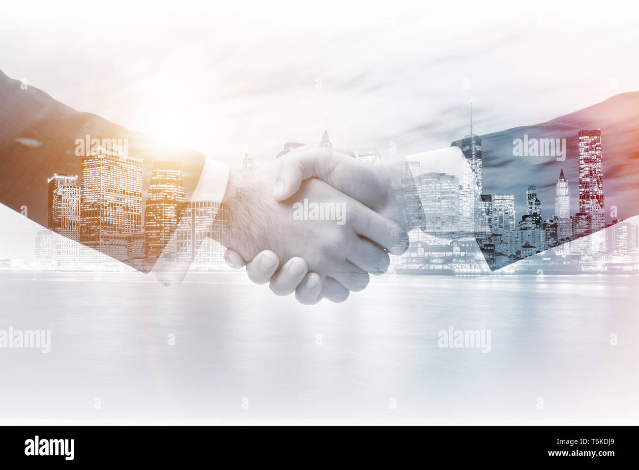 Concept of cooperation with handshake Stock Photo - Alamy