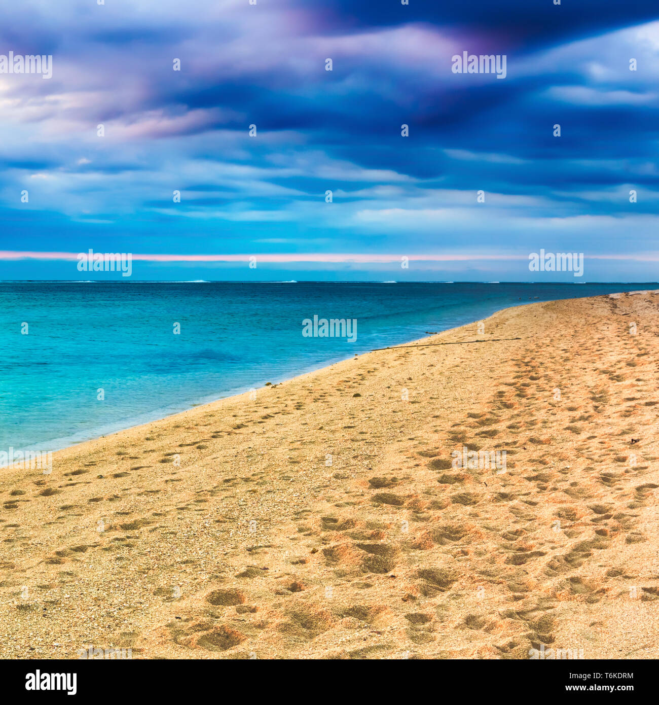 Beautiful sunset over sandy beach hi-res stock photography and images ...