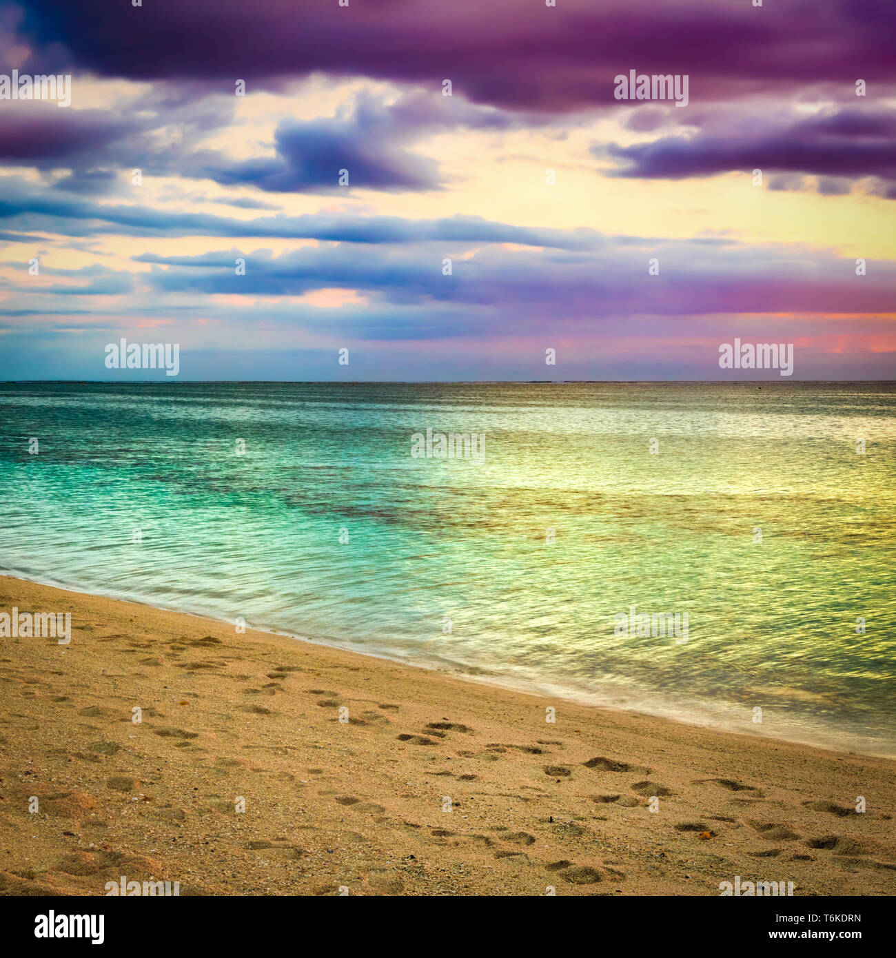 Beautiful sunset over sandy beach hi-res stock photography and images ...