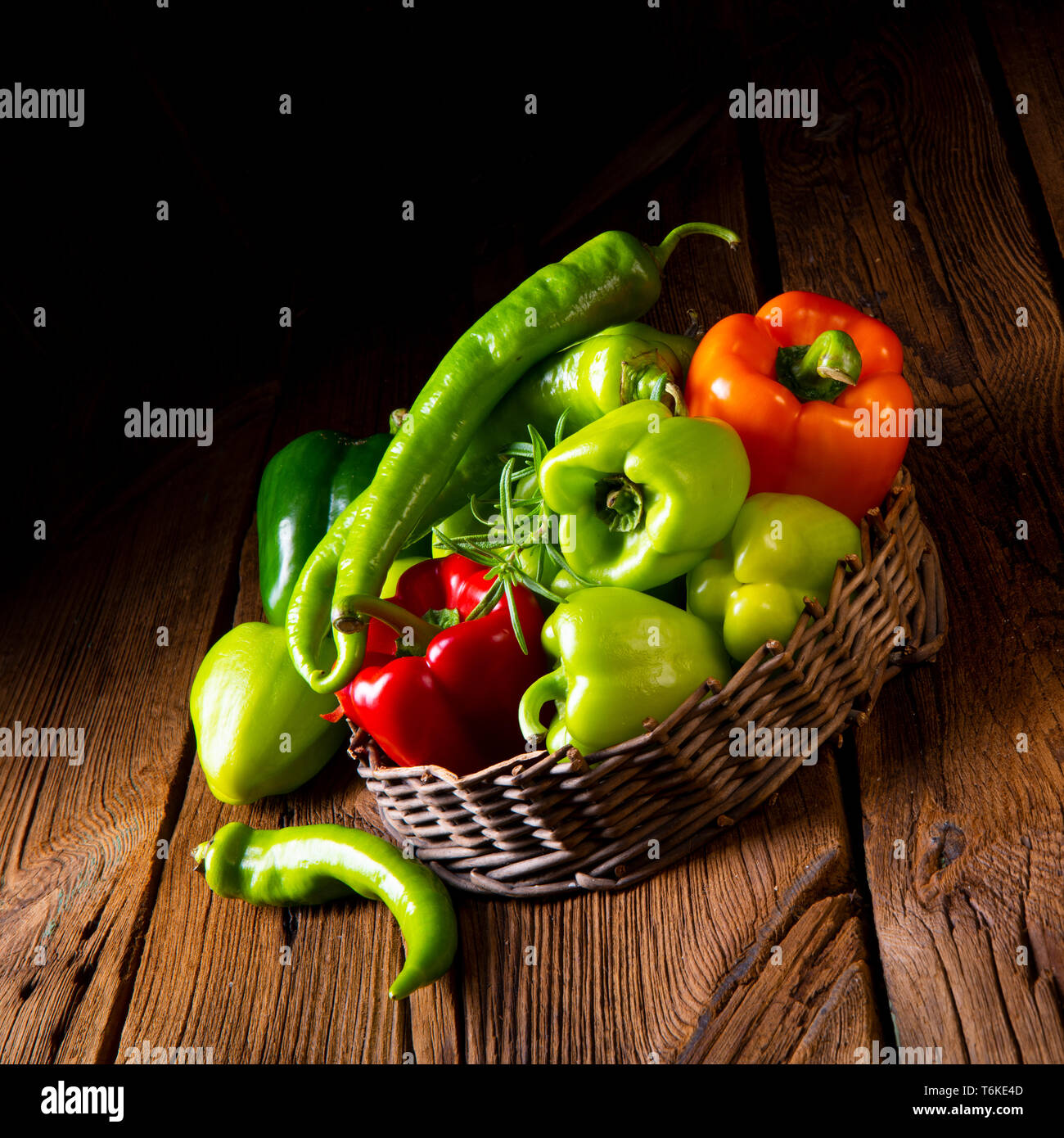 various harvested peppers and hot peppers in basket Stock Photo - Alamy