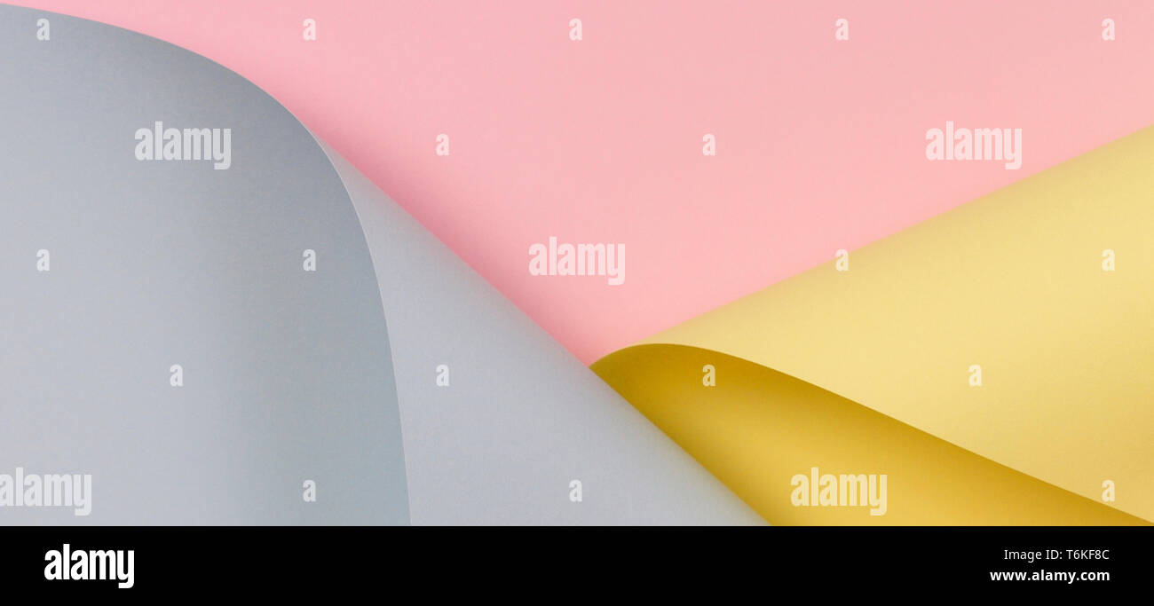 Abstract background. Pastel pink, yellow, blue color paper in geometric ...