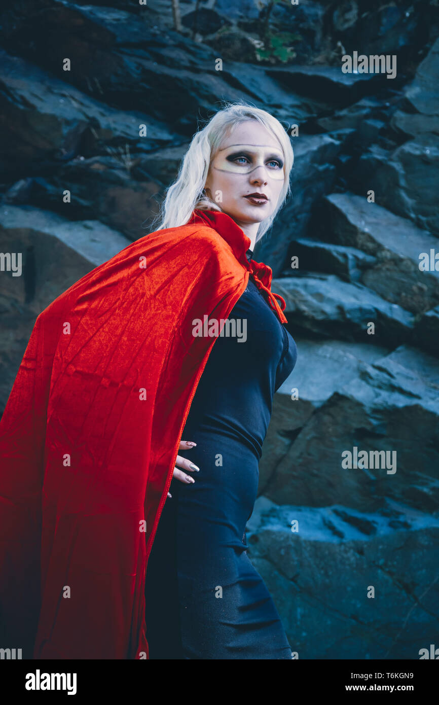 Wearing red cape hi-res stock photography and images - Alamy