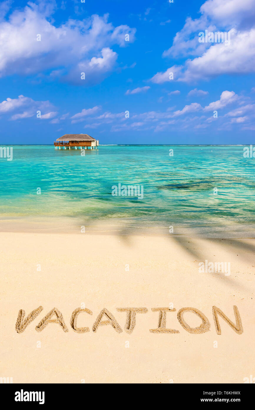 Word Vacation on beach Stock Photo - Alamy