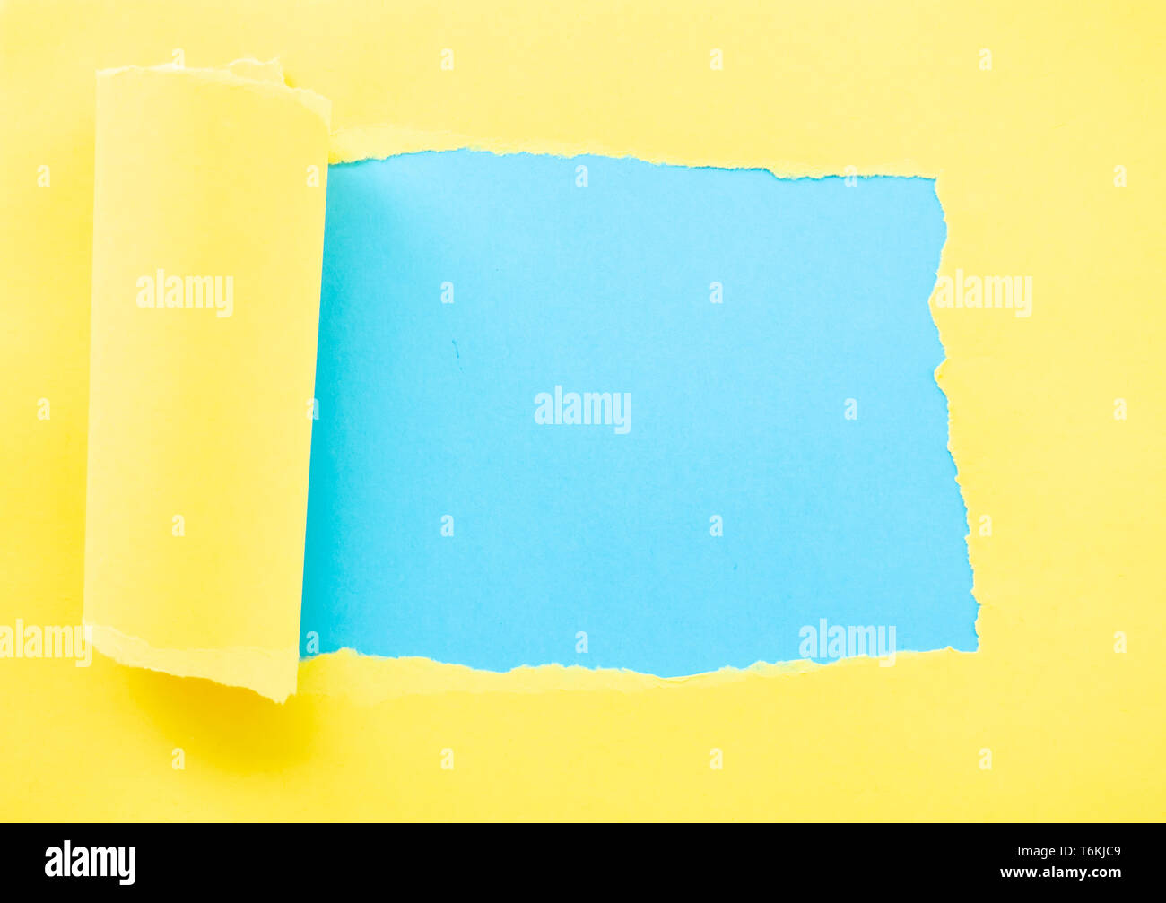 Torn yellow paper hi-res stock photography and images - Alamy