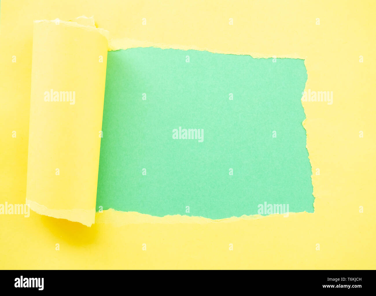 Torn yellow paper hi-res stock photography and images - Alamy