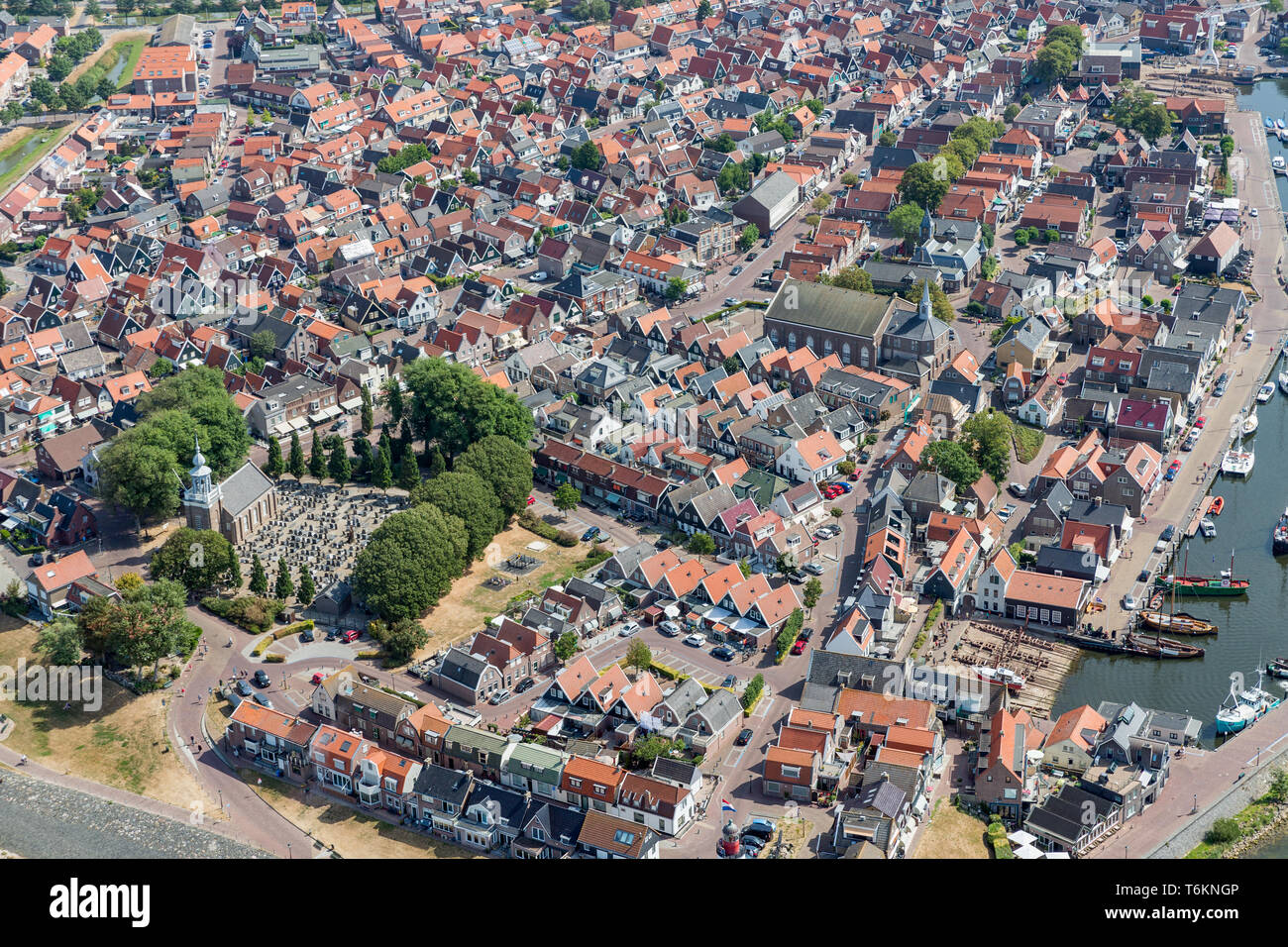 Aerial view Dutch fishing village with harbor and residential area ...