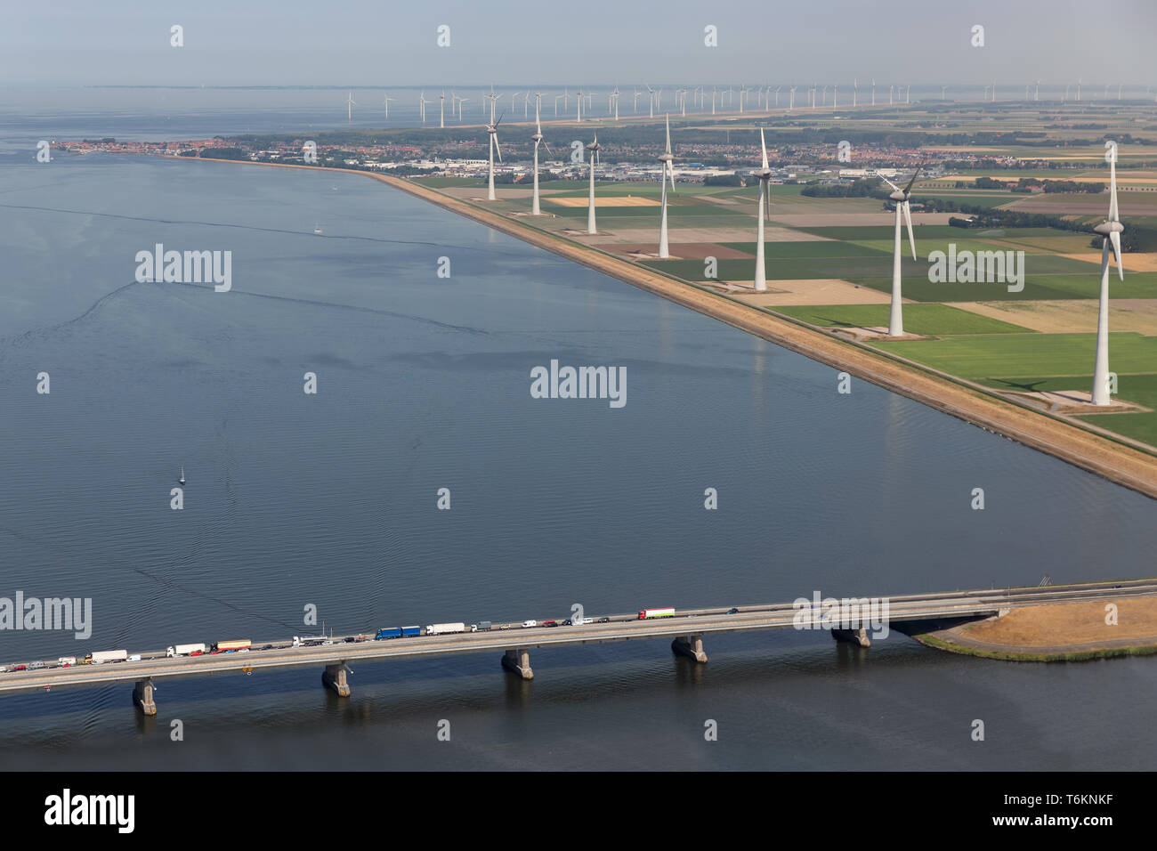 Aerial view Dutch landscape with bridge and wind turbines Stock Photo ...