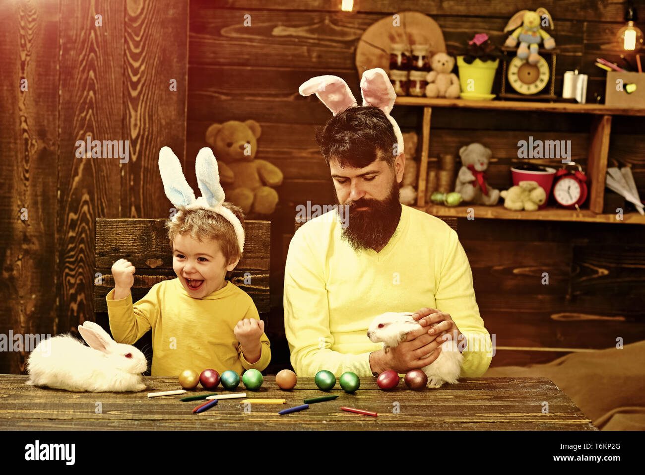 Easter family with fake bunny ears Stock Photo - Alamy