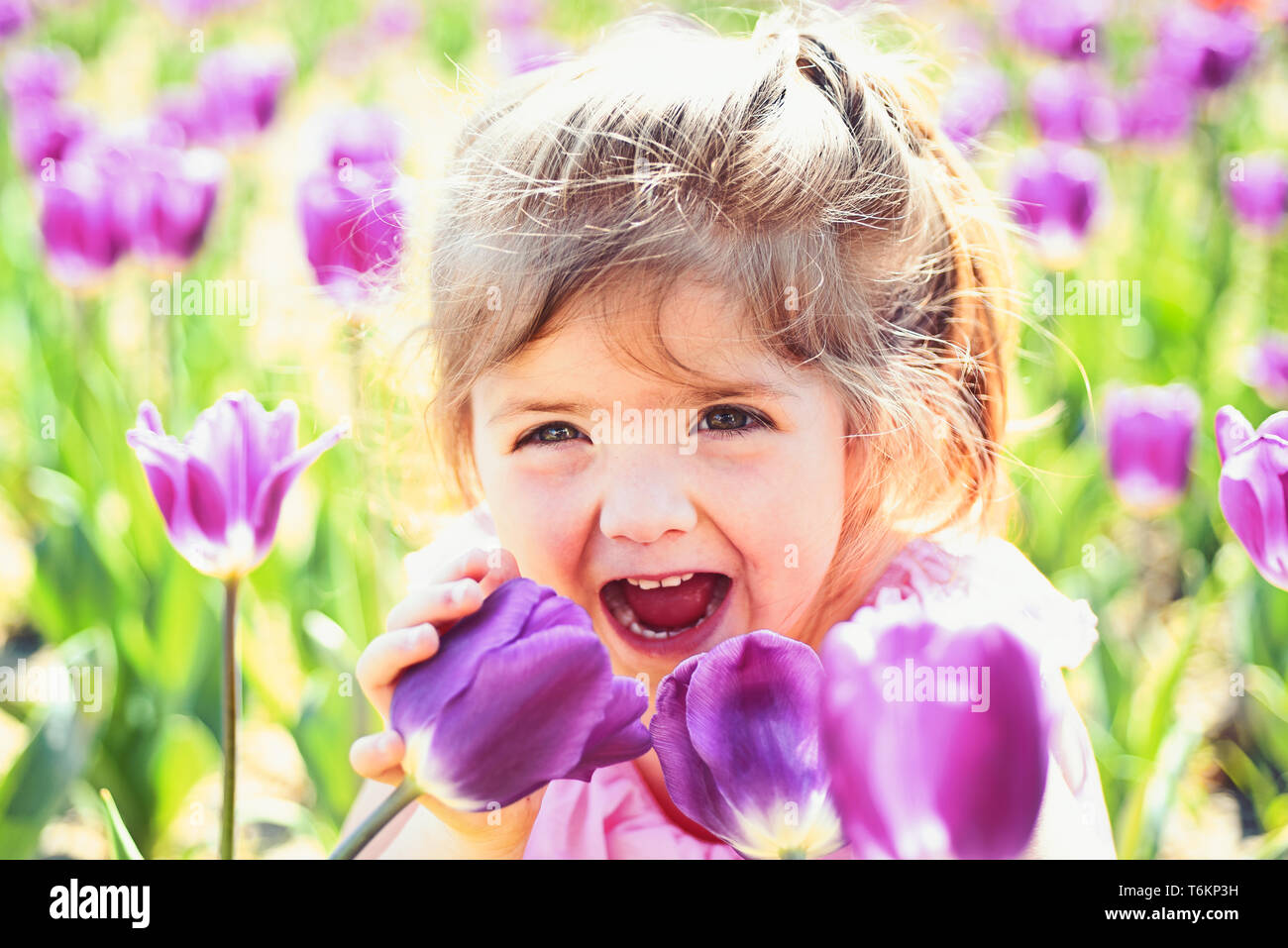 Summer girl fashion. Happy childhood. Springtime tulips. weather ...