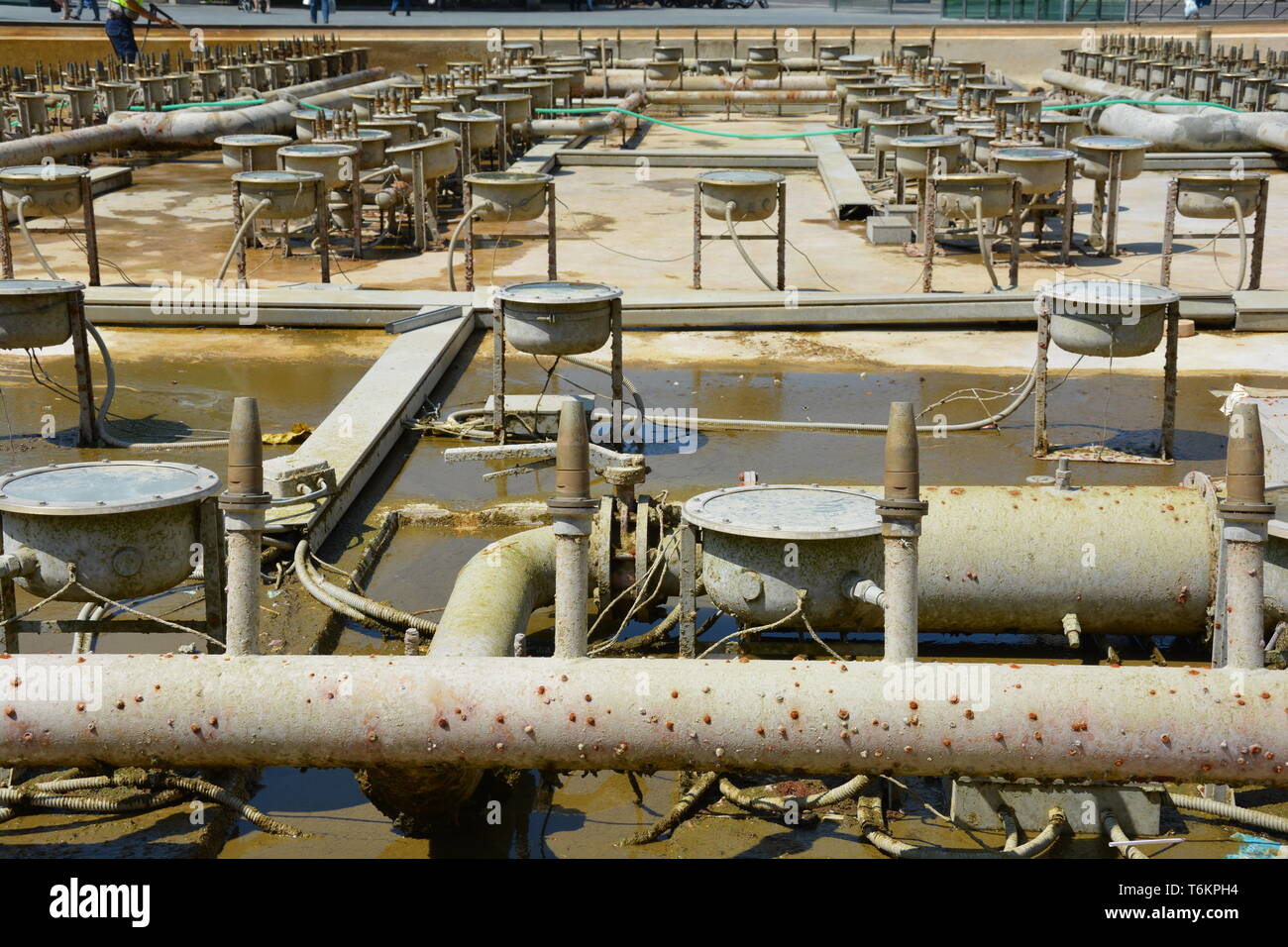 an empty fountain, floodlights and piping Stock Photo - Alamy