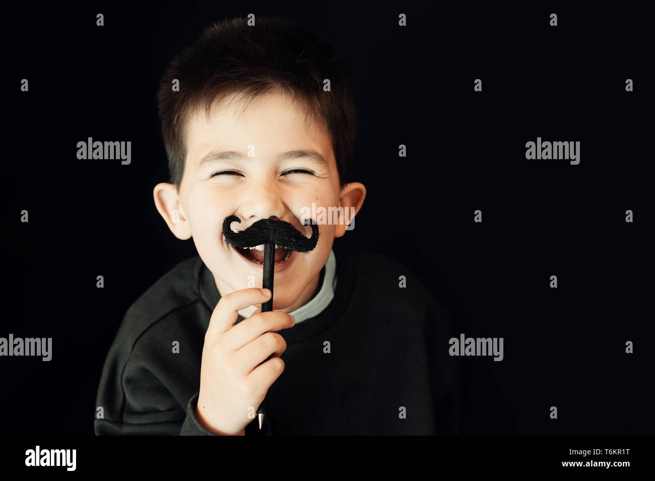 Fake smile boy hi-res stock photography and images - Alamy