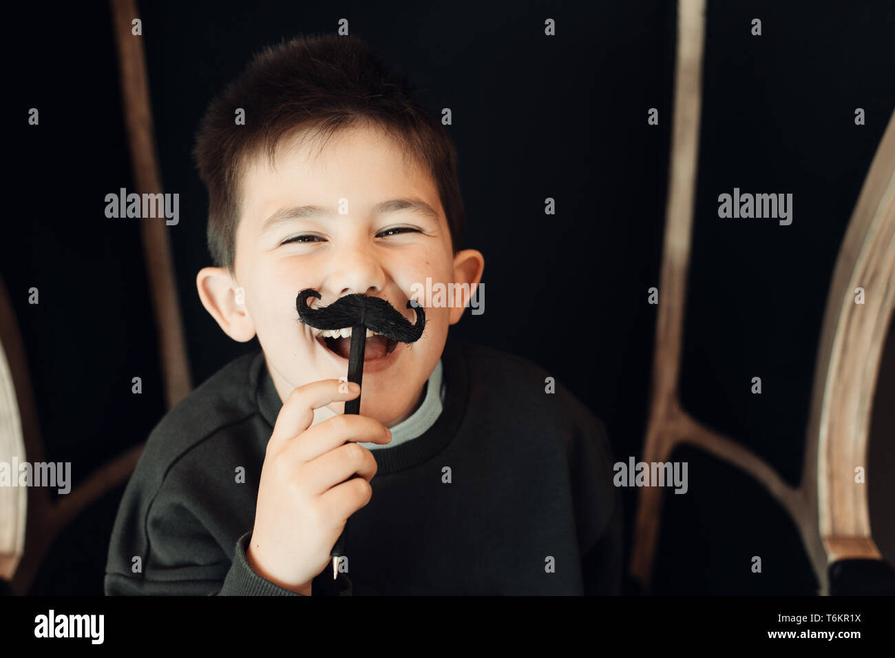 Fake smile boy hi-res stock photography and images - Alamy
